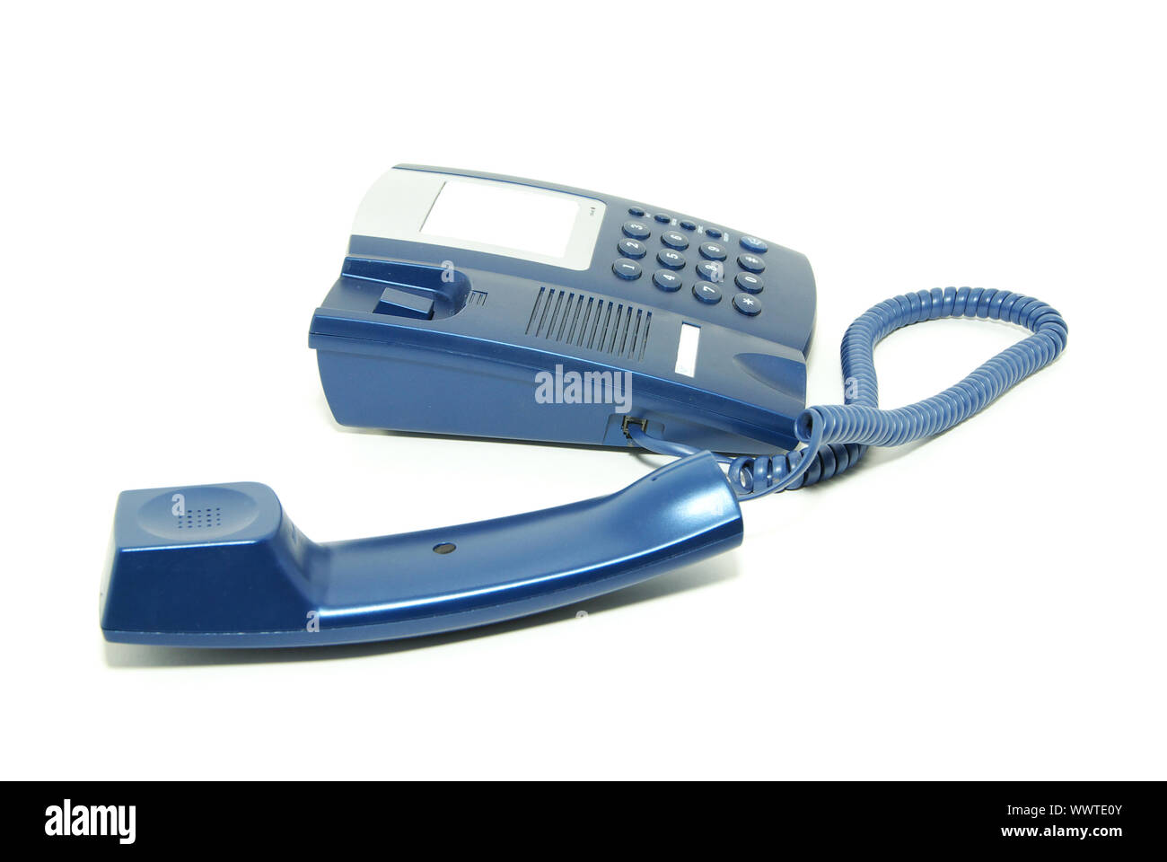 blue office telephone on a white background Stock Photo - Alamy