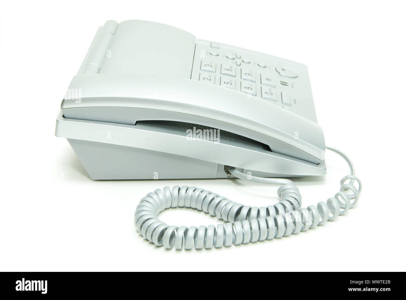 grey office telephone on a white background Stock Photo - Alamy