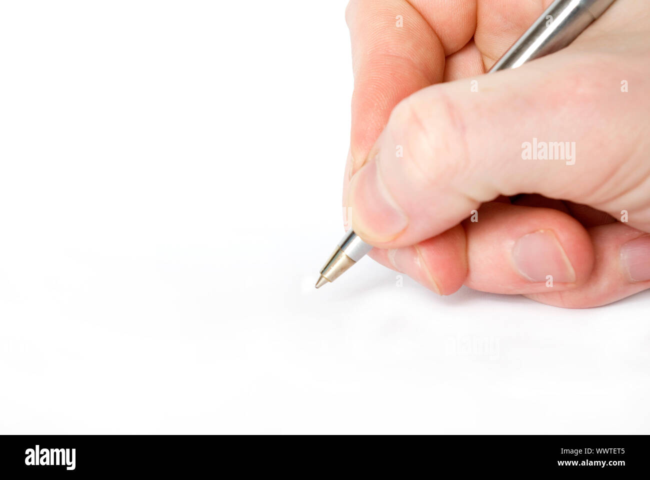 Hand holding pen isolated on white background Stock Photo - Alamy