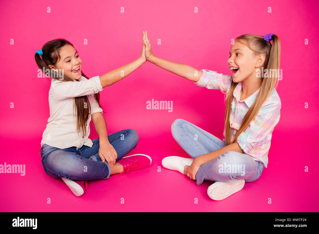 Close up side profile photo two little age she her girls hands arms ...