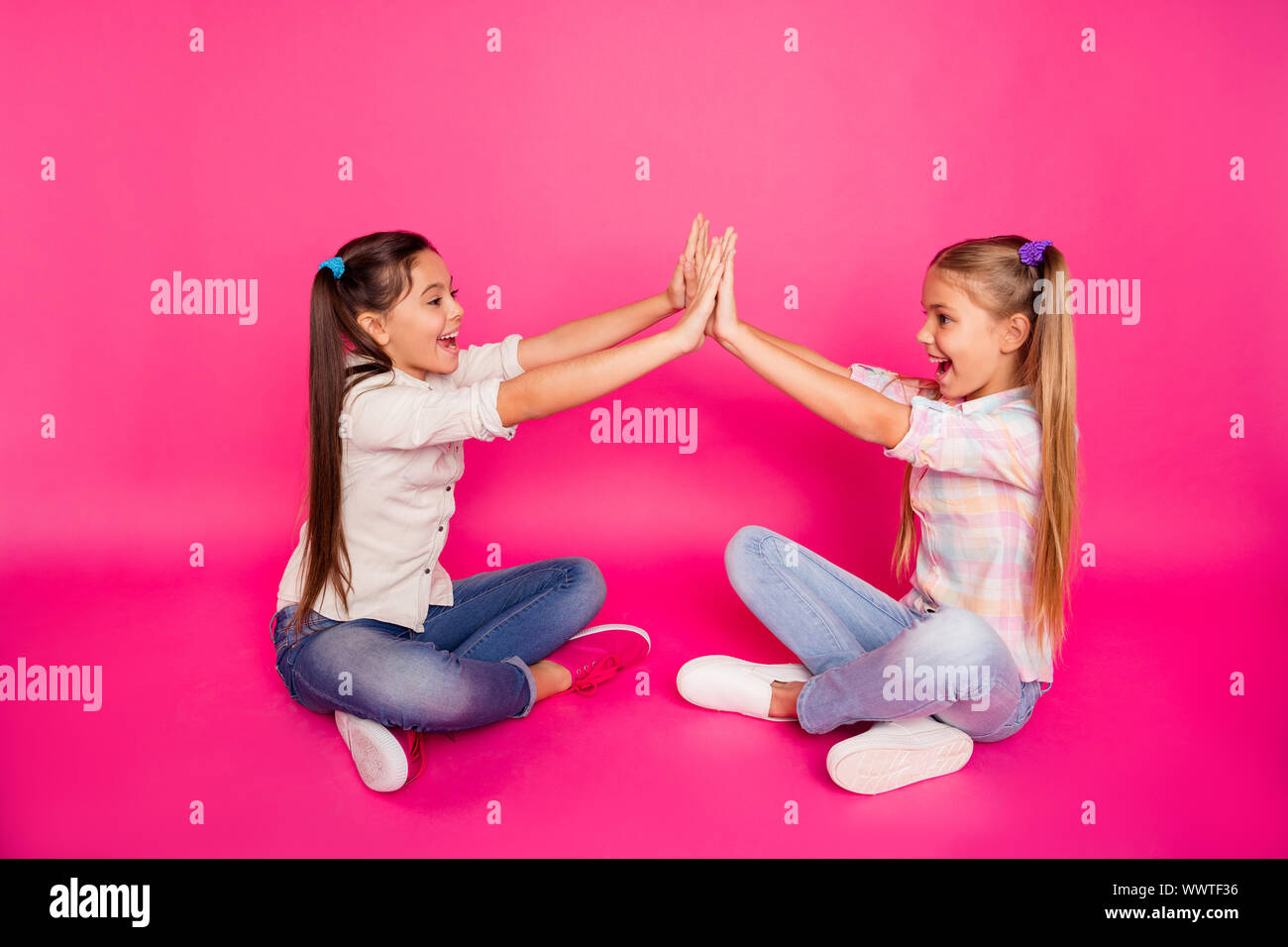 Close up side profile photo two little age she her girls hands arms ...