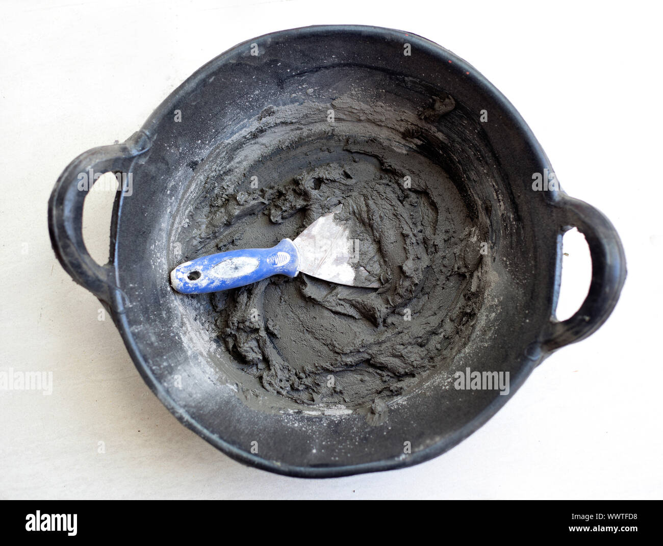 cement portland gray fresh mortar mix with spatula tool in bucket Stock ...