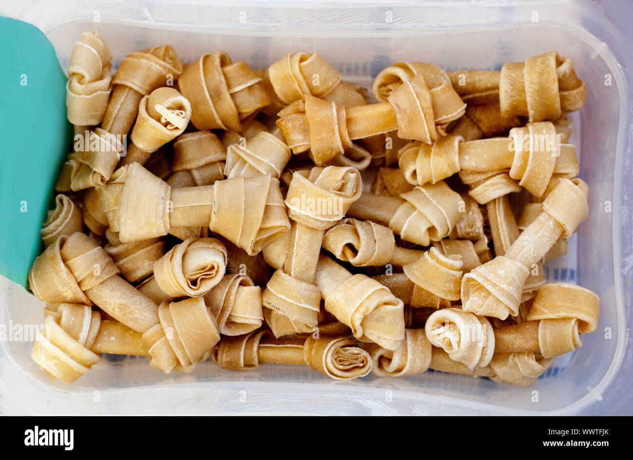 dog food with bone shape to reward the training Stock Photo - Alamy