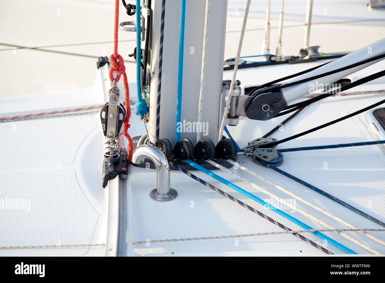 Detail of sailboat mast bottom with ropes and pulleys Stock Photo - Alamy