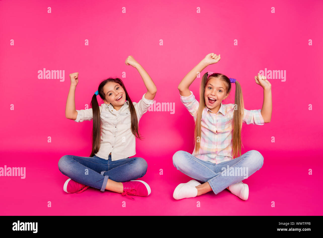 Close up photo two little age she her girls hands arms up best friends ...