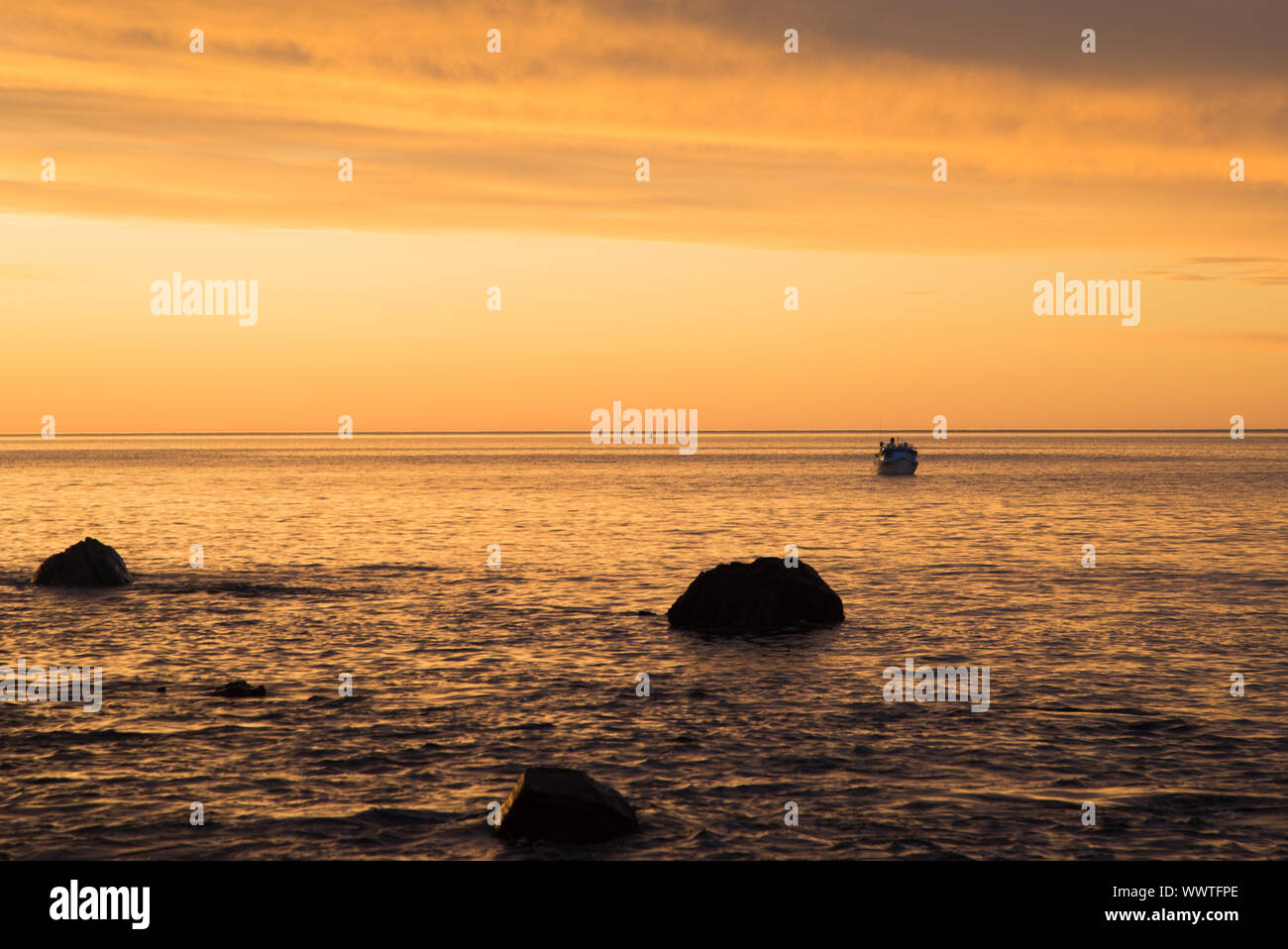 Sunset at Hallet Cove, South Australia with a boat and rocks Stock ...
