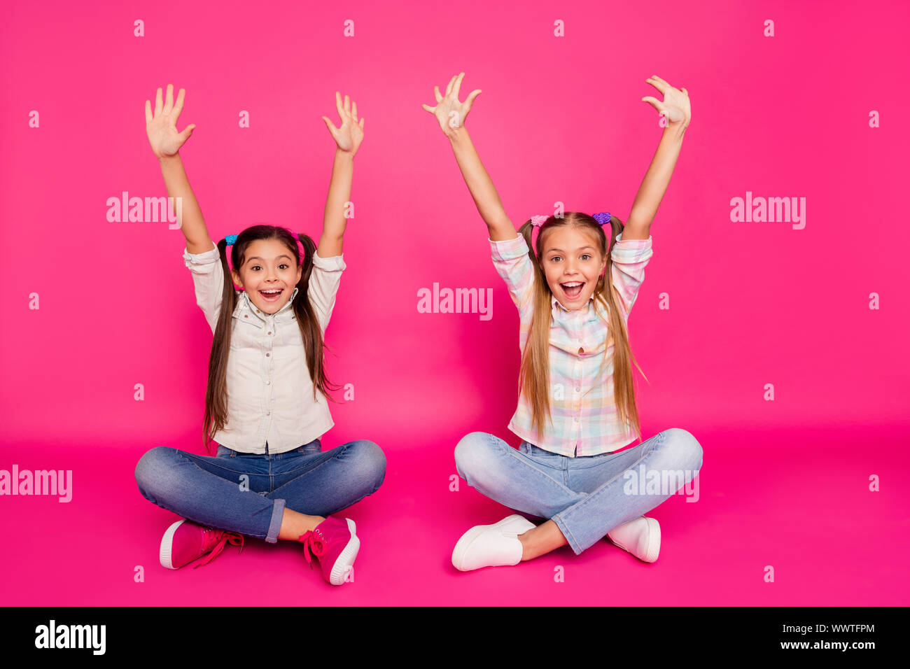 Close up photo two little age she her girls hands arms up best friends ...