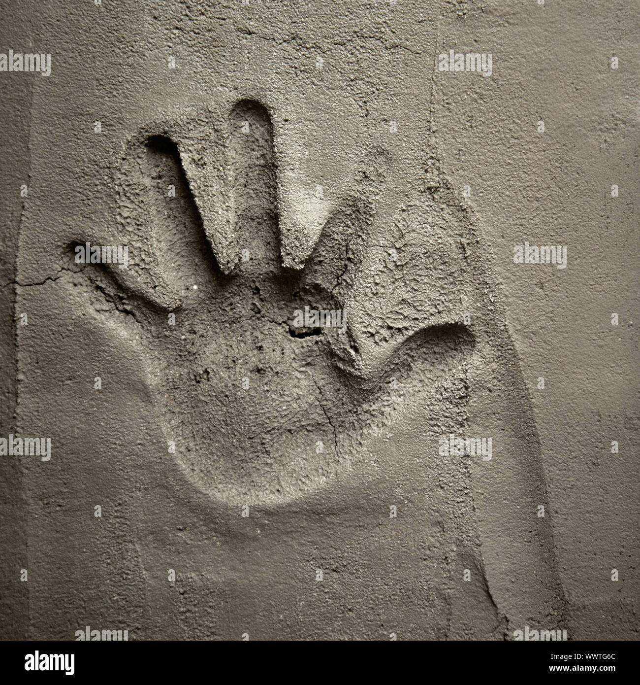 hand print on cement mortar wall with shadow relief Stock Photo - Alamy