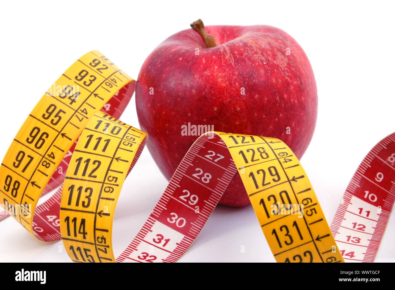 apple and measuring tape isolated on white background Stock Photo - Alamy
