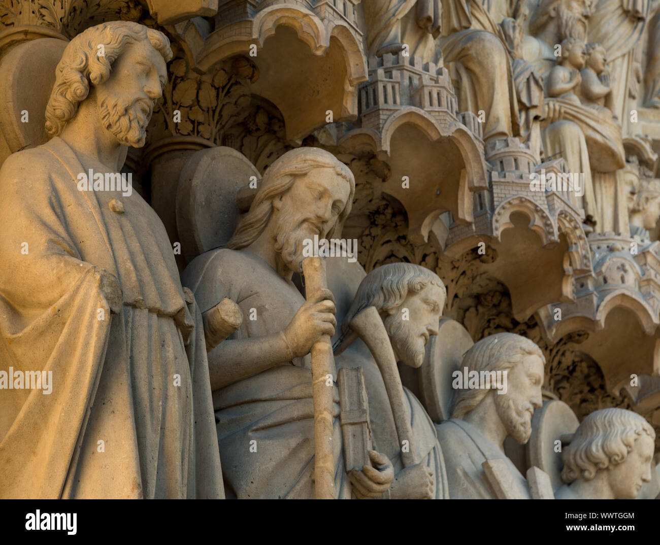 Statues at the gate of a church entrance france Stock Photo - Alamy
