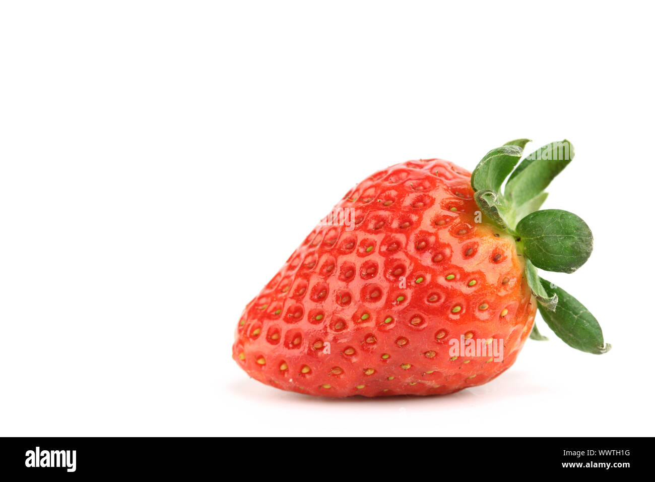 one strawberry on white background Stock Photo - Alamy