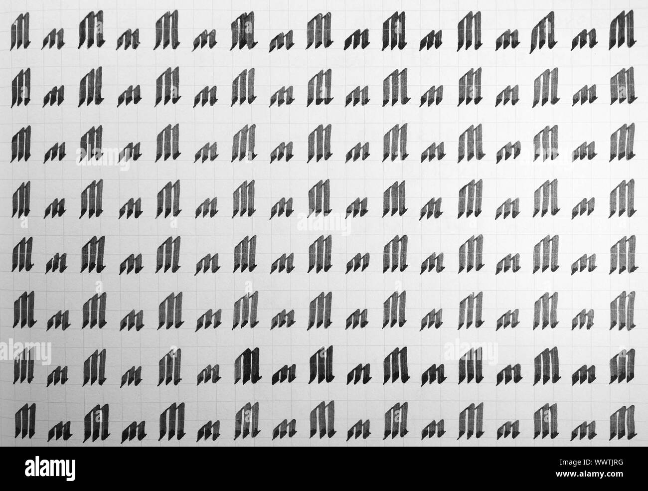 Calligraphy black and white letters M background. Lettering practice ...