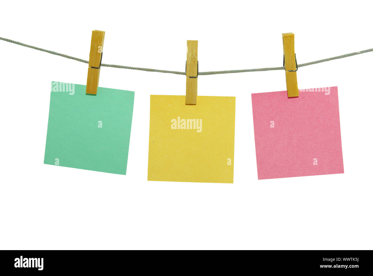 note paper blanks on rope isolated on white Stock Photo - Alamy