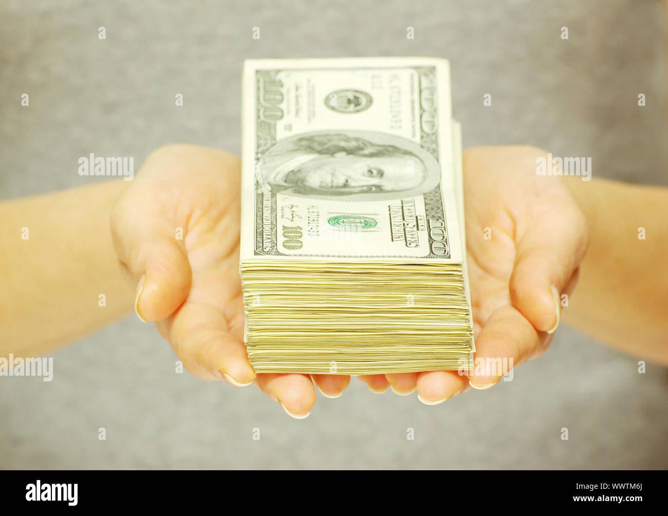Hand with money isolated on white background Stock Photo - Alamy