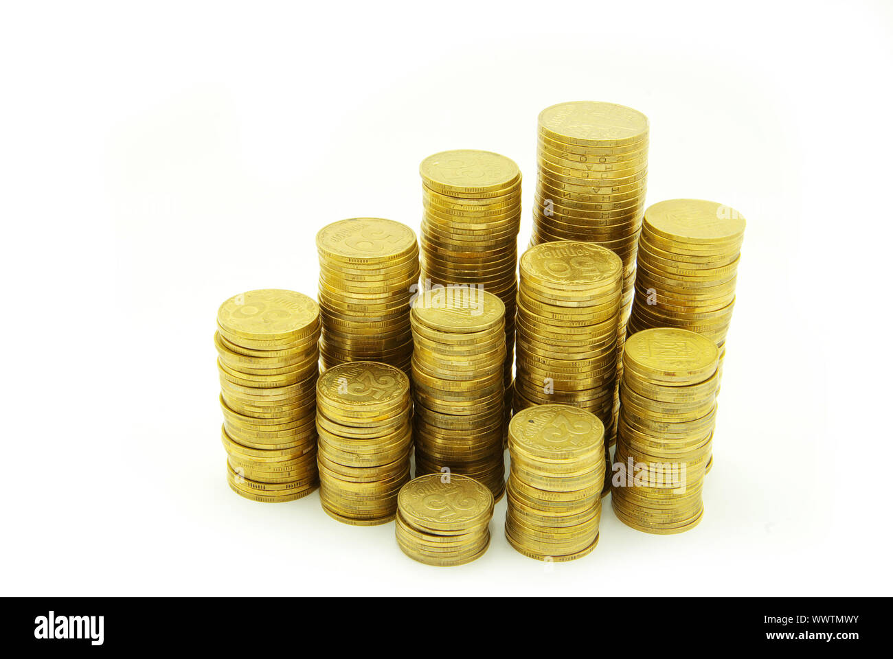towers of coins isolated on a whiteness Stock Photo - Alamy