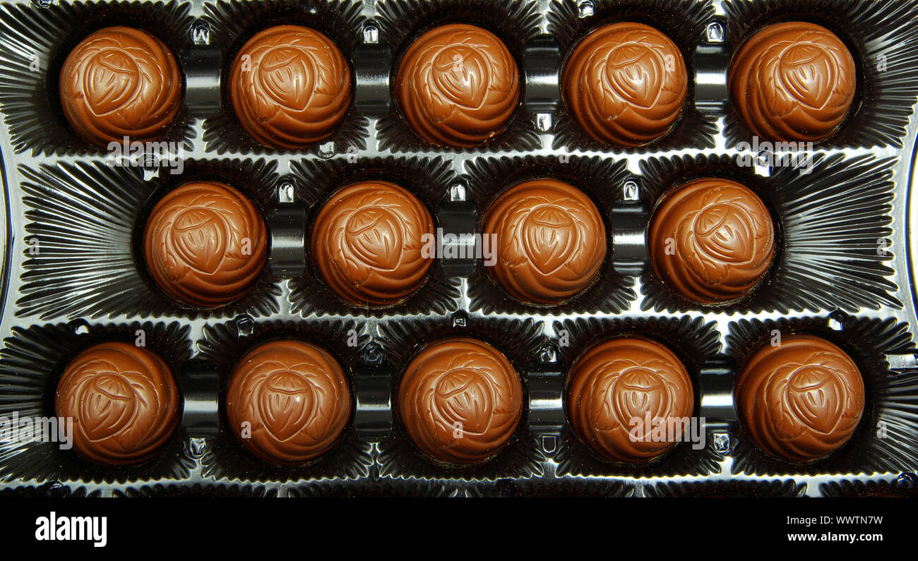 delicious chocolate truffles in box Stock Photo - Alamy