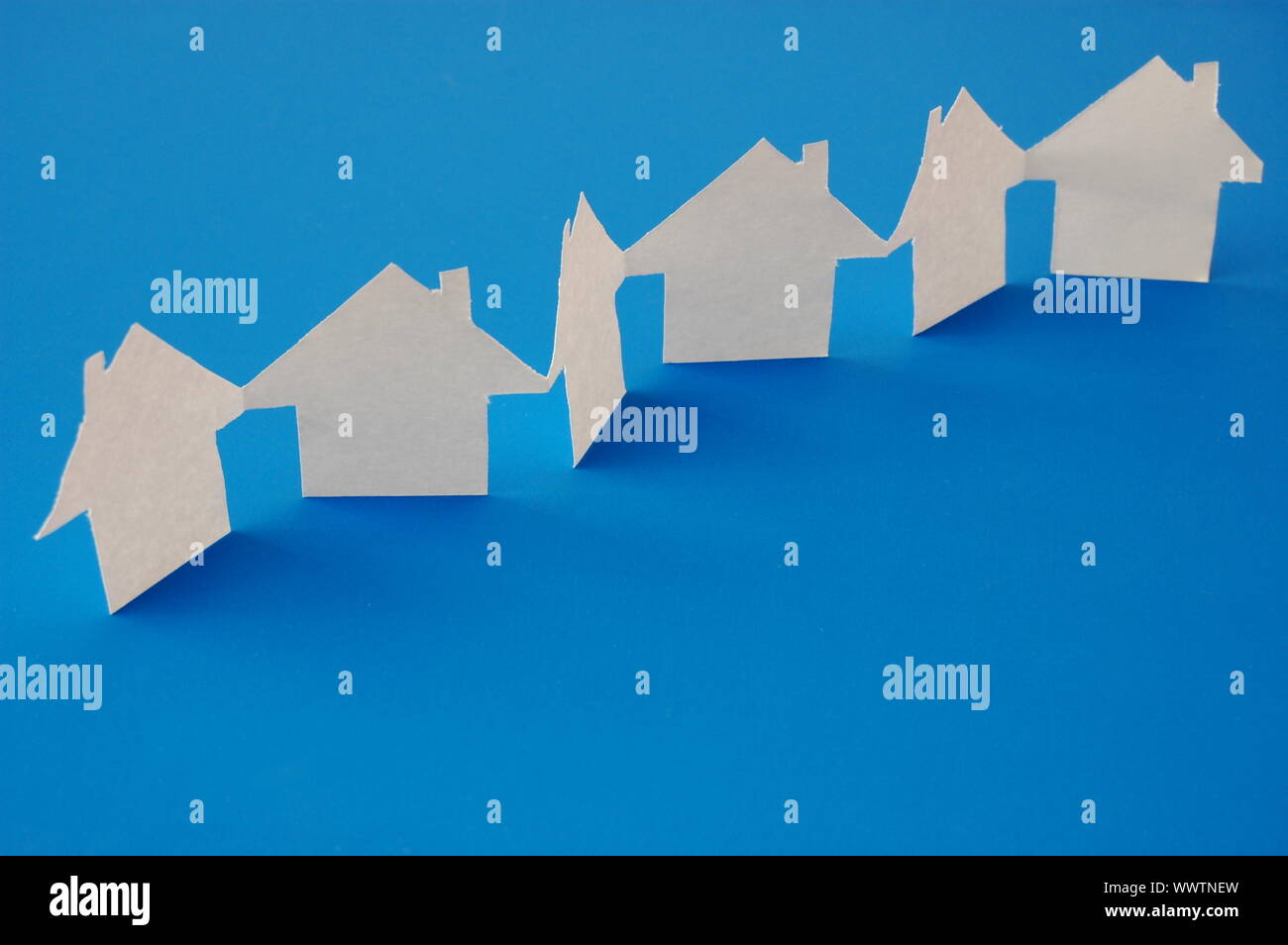 paper houses or homes showing a concept for real estate Stock Photo - Alamy