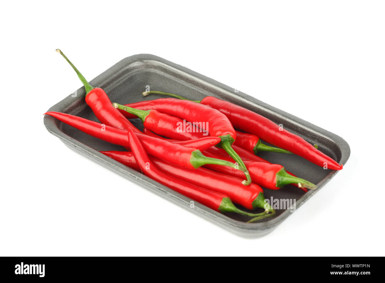 chilli pepper pack isolated on white background Stock Photo - Alamy