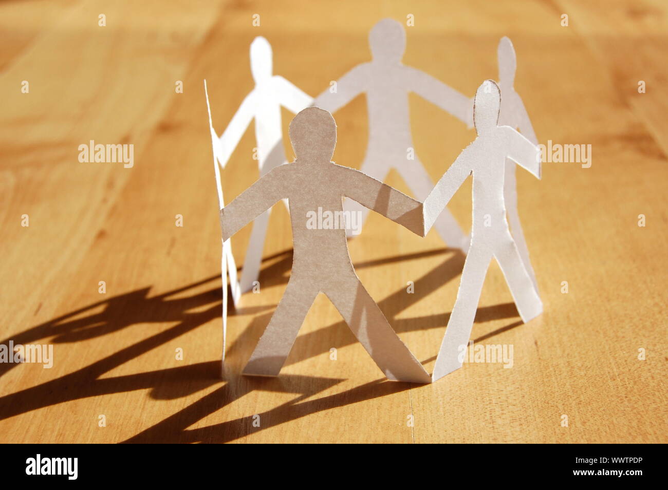 paper man showing concept for business teamwork and love Stock Photo ...