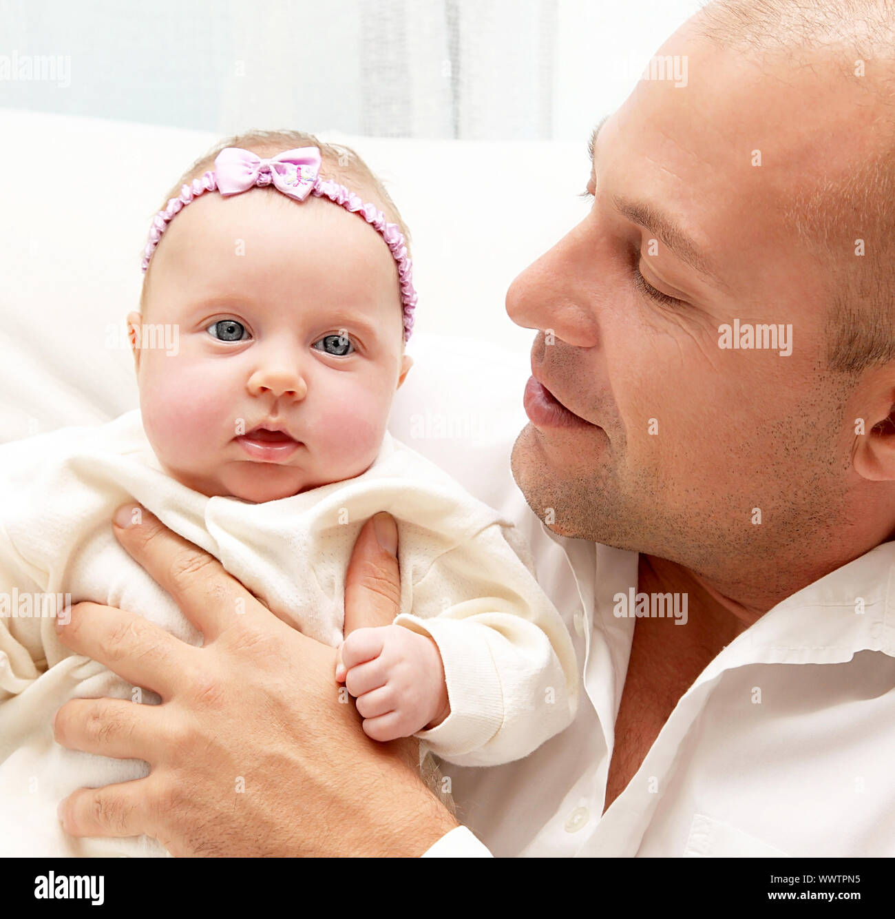 Happy father with a baby Stock Photo - Alamy