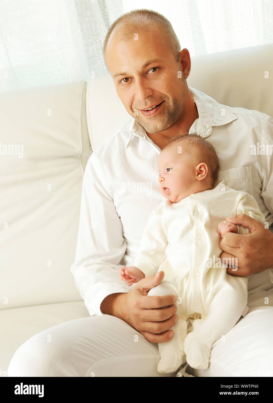 Happy father with a baby Stock Photo - Alamy