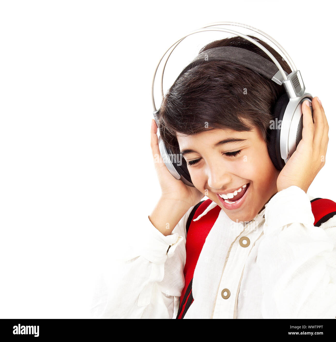 Pretty teen boy enjoying music Stock Photo - Alamy