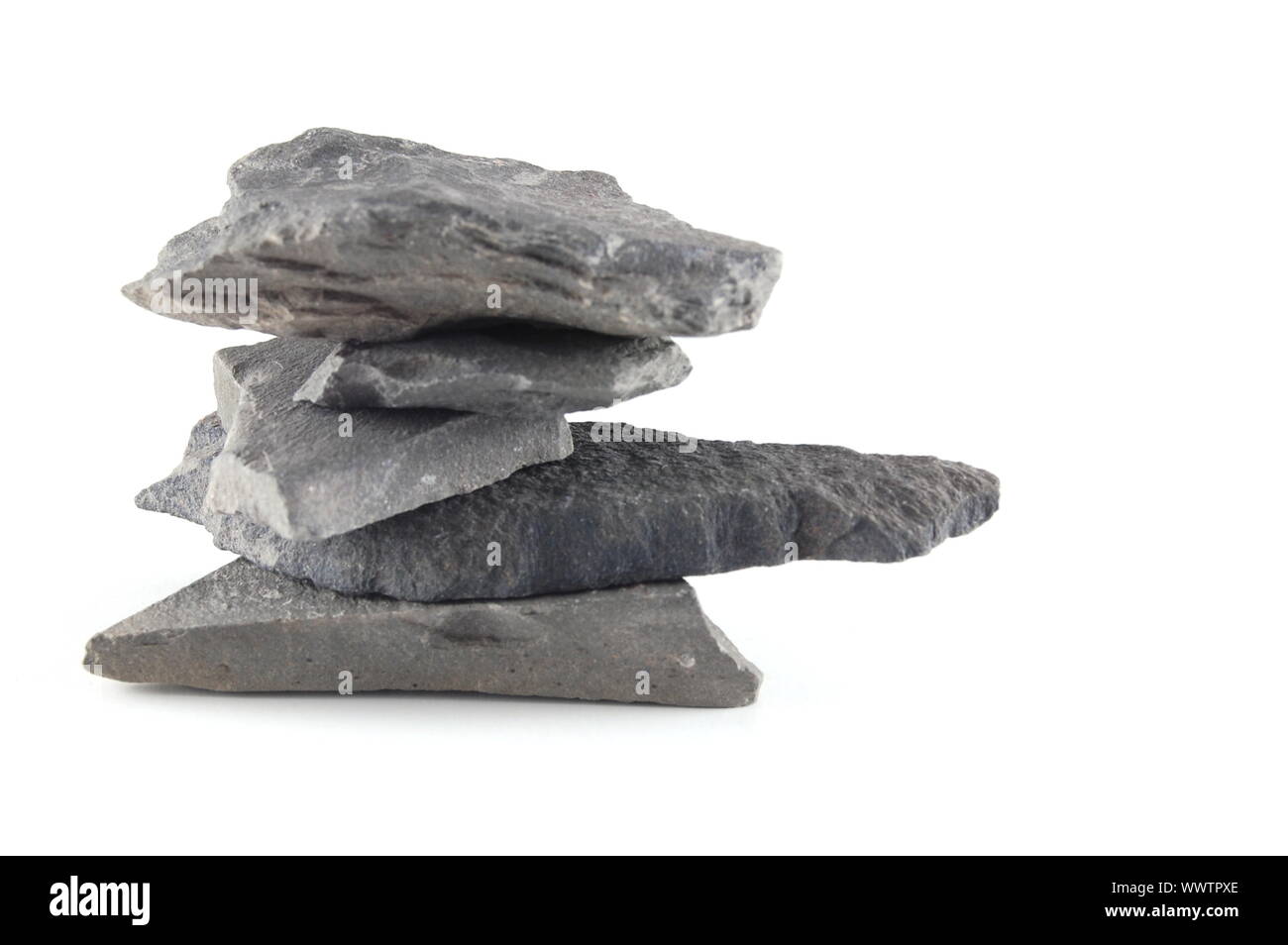 A tower made of stones isolated on a white background Stock Photo - Alamy