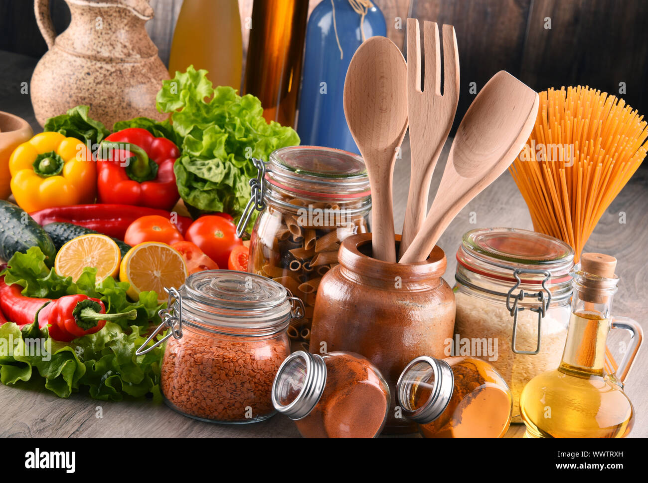 Composition with assorted food products and kitchen utensils on the ...