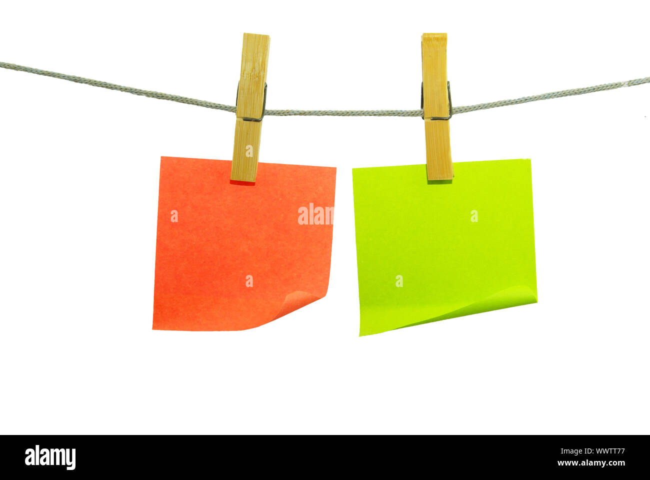 note paper blanks on rope isolated on white Stock Photo - Alamy