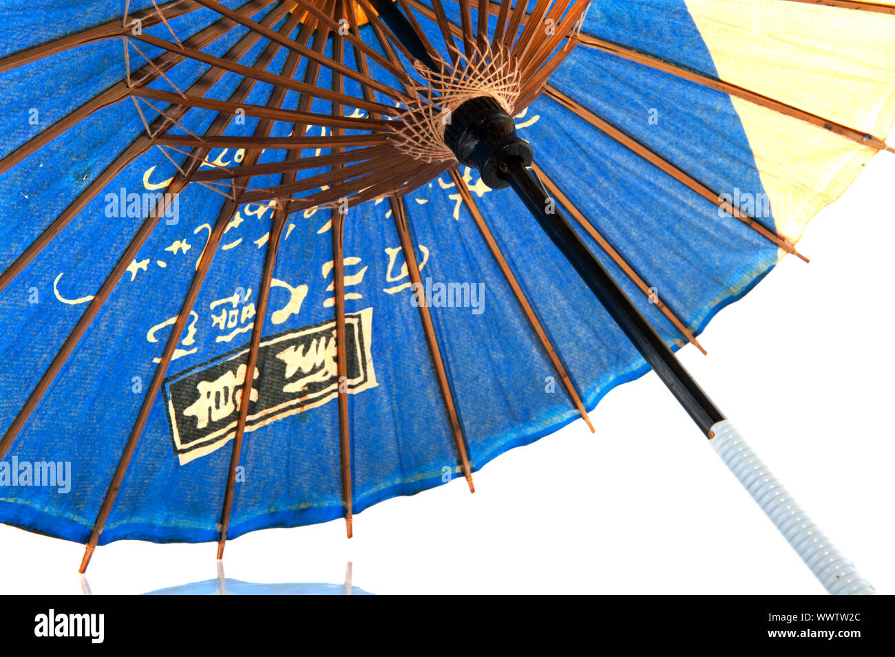 Detail of an Japanese paper parasol on white background Stock Photo - Alamy