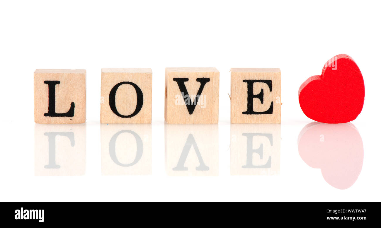 Love in text with letters and red heart Stock Photo - Alamy