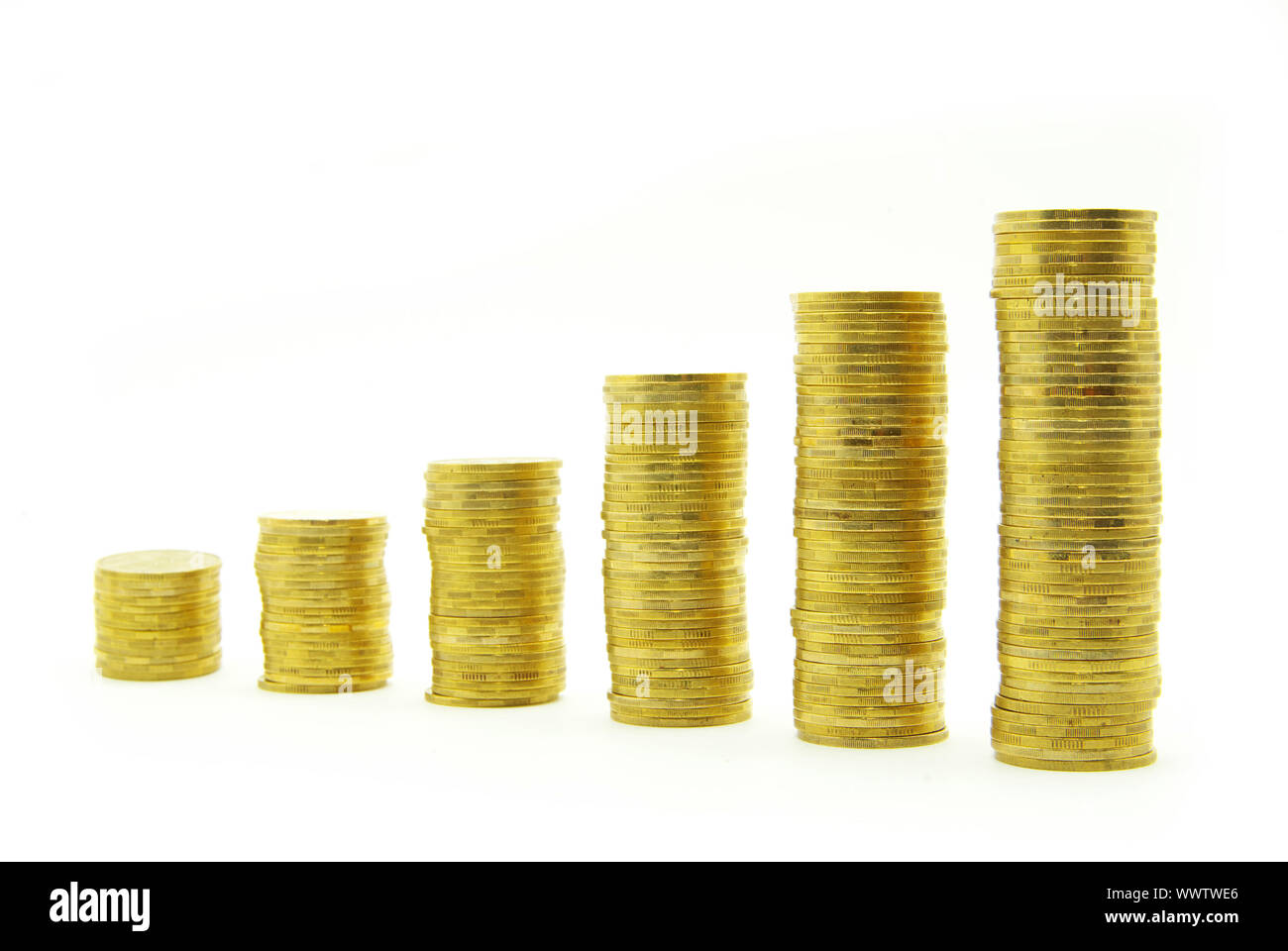 towers of coins isolated on a whiteness Stock Photo - Alamy