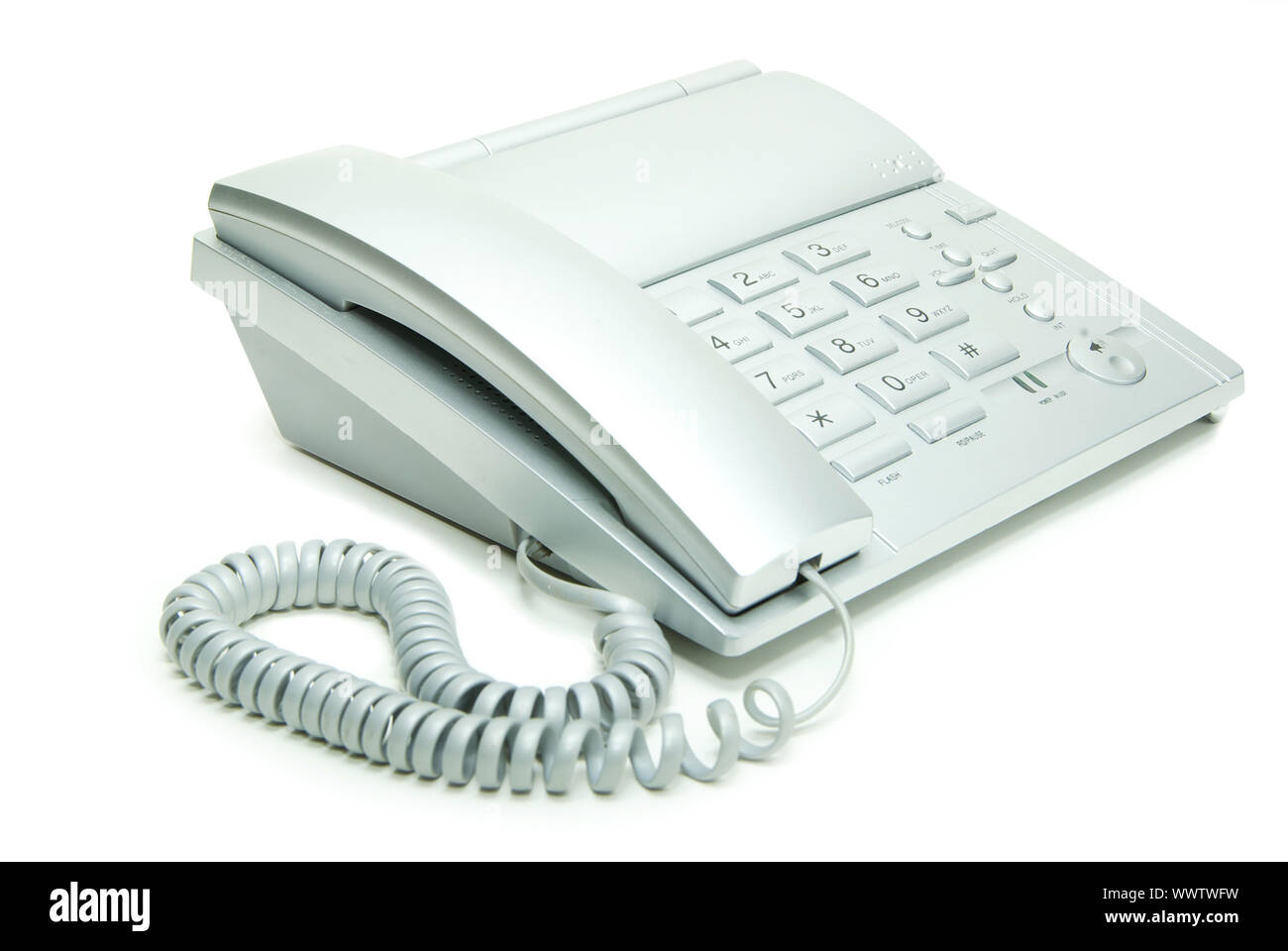 grey office telephone on a white background Stock Photo - Alamy