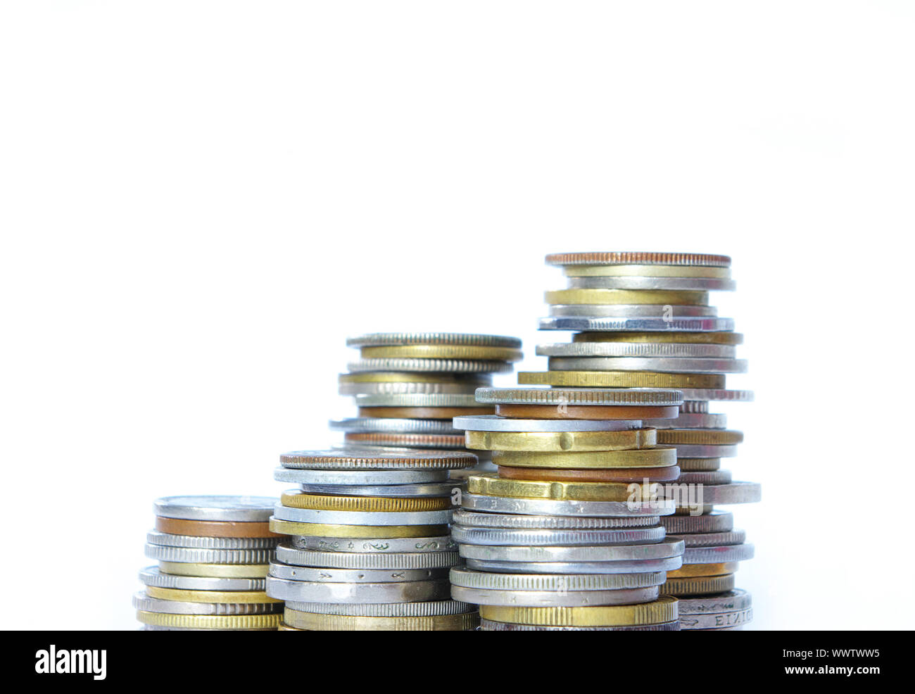 Coin pile isolated on white background Stock Photo - Alamy