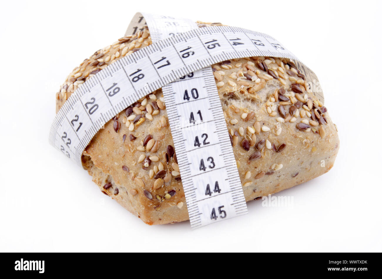 multigrain roll with centimeter measuring tape Stock Photo - Alamy