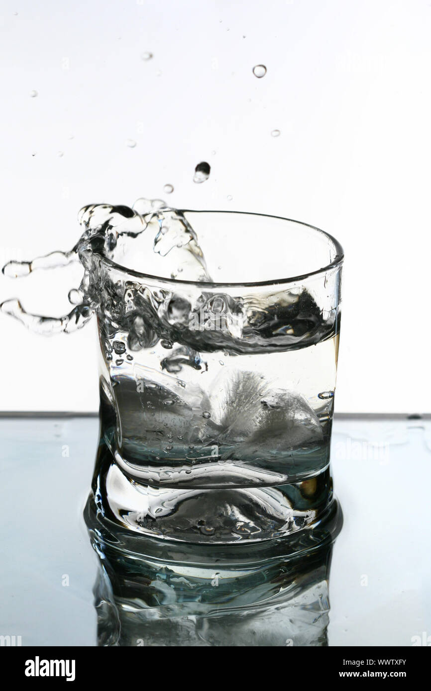 vodka alcohol elegant splash bar background Stock Photo - Alamy