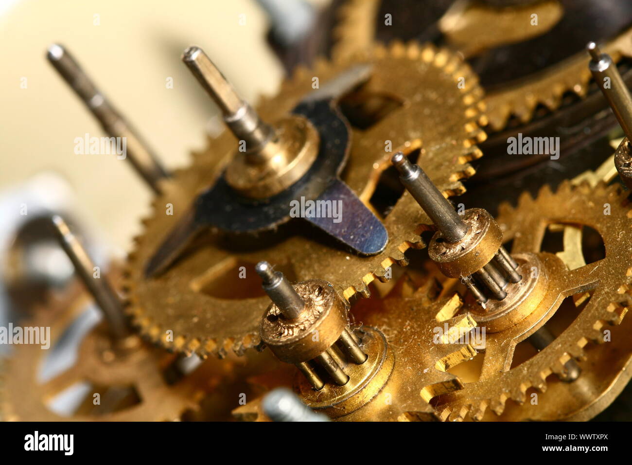 time gear inside my rare clock Stock Photo - Alamy