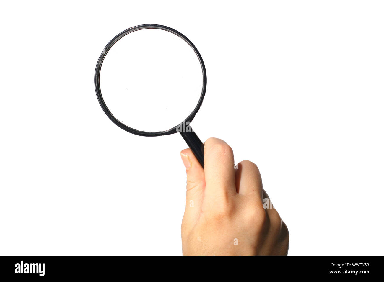 discovery magnifier hand take in fingers Stock Photo - Alamy