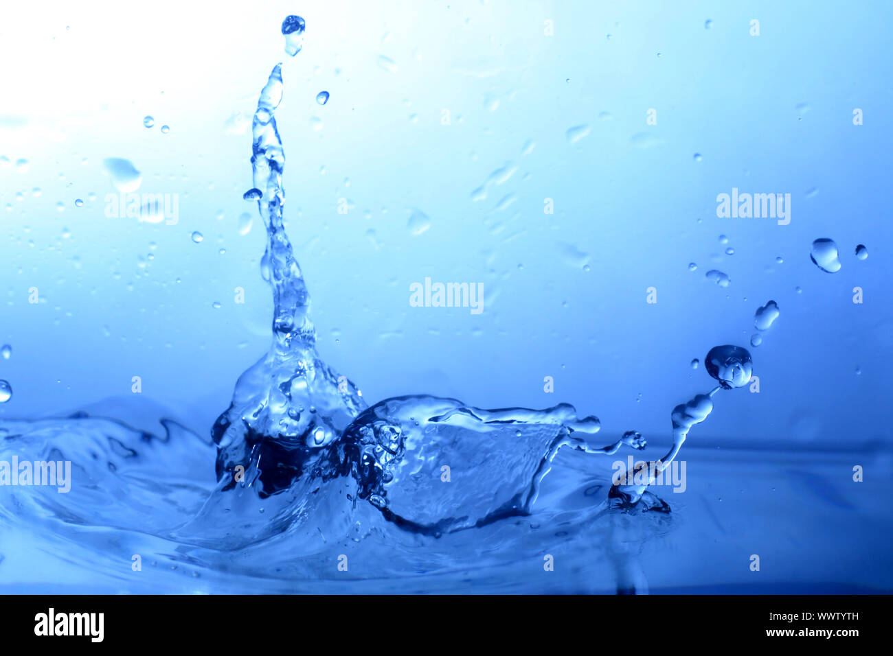 great blue water splash close up macro Stock Photo - Alamy