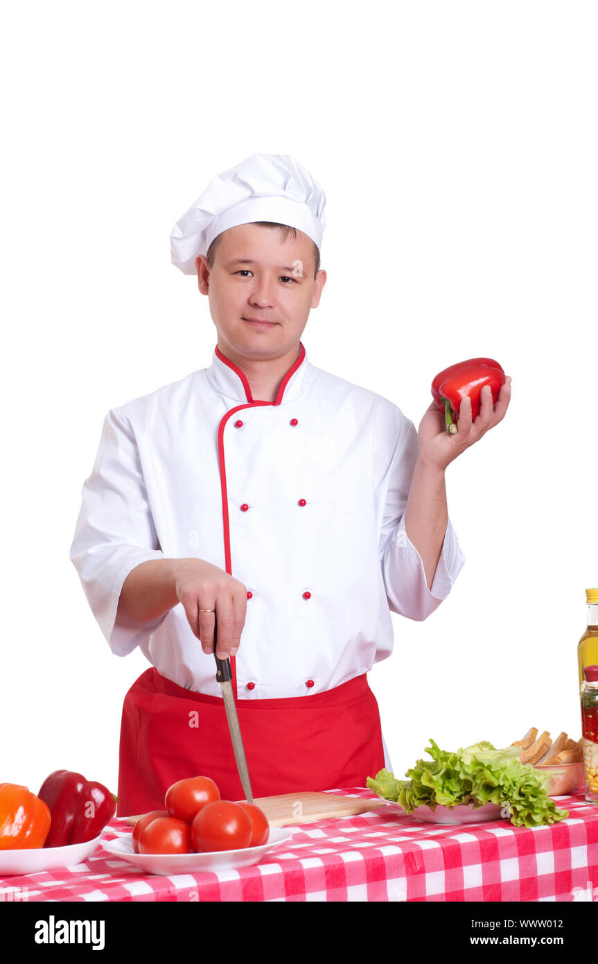 Handsome man cooking in the kitchen, white background Stock Photo - Alamy