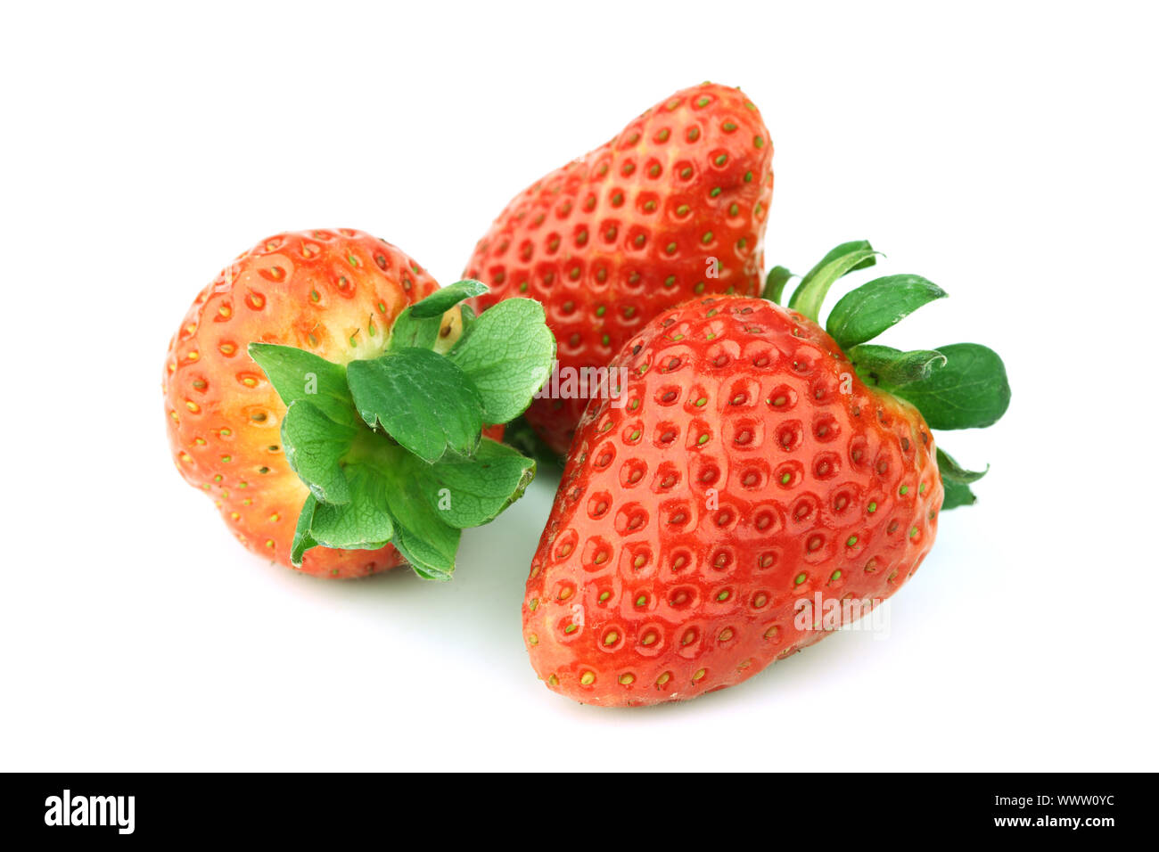strawberry pile on white background Stock Photo - Alamy