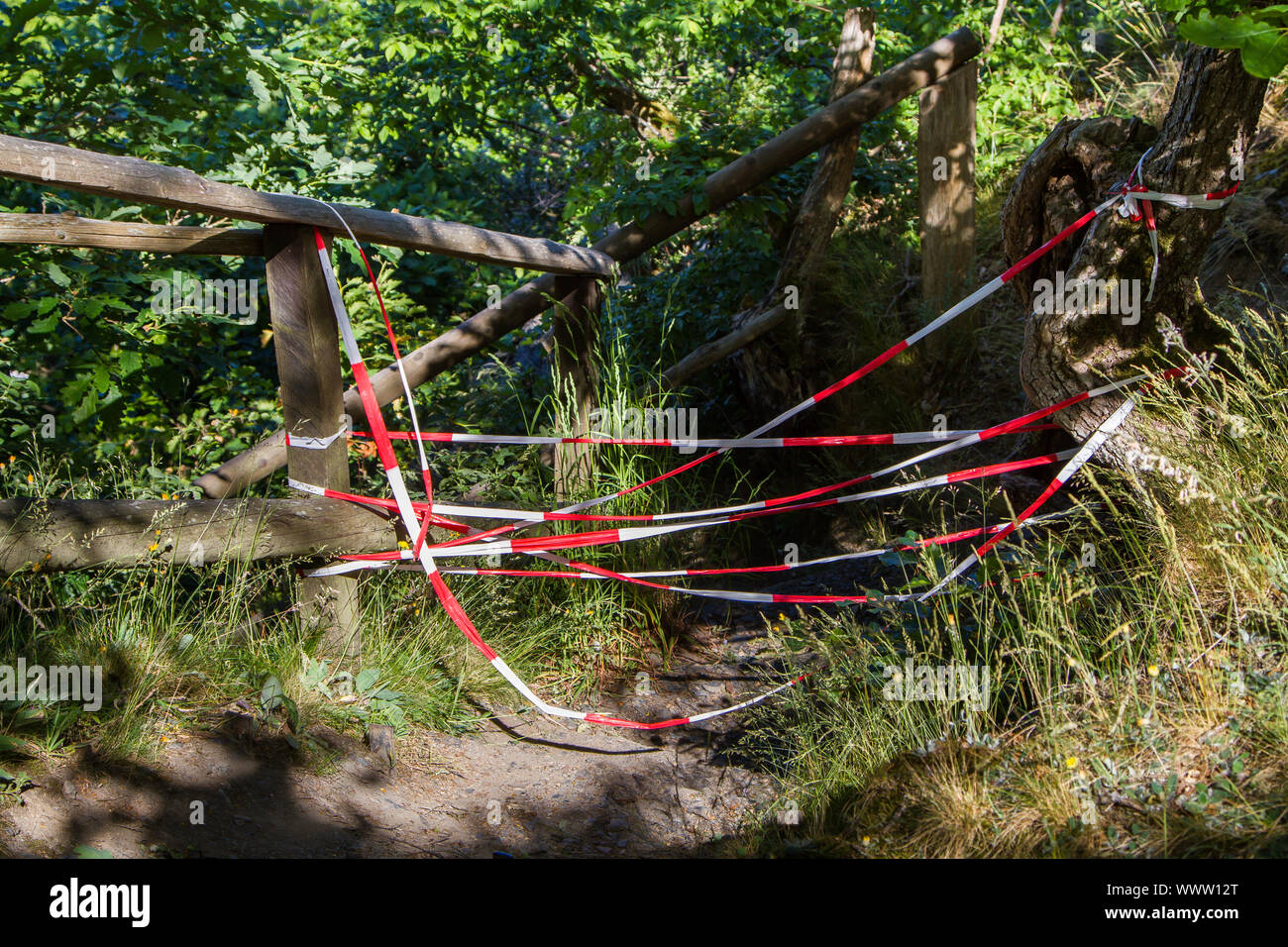 blocked off way with flutter tape Stock Photo - Alamy