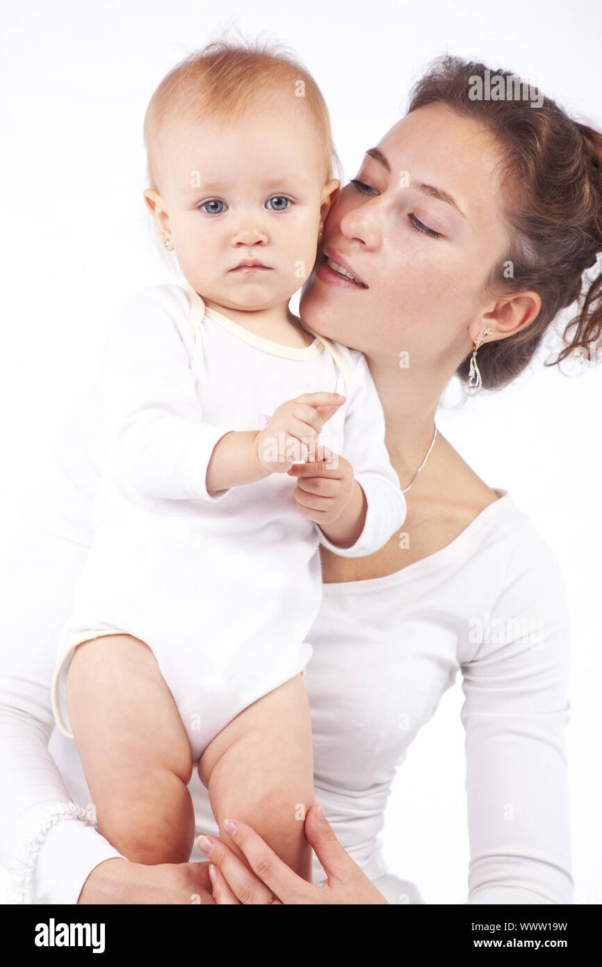 Young mother with her baby over white Stock Photo - Alamy