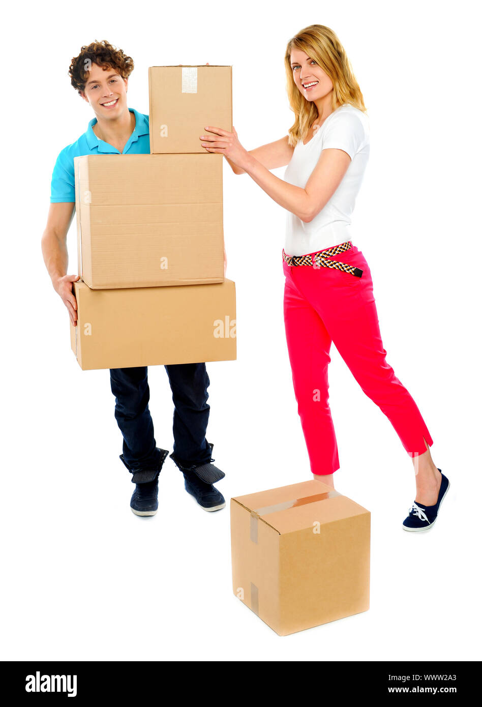 American woman placing boxes as guy holds the stack. All on white ...