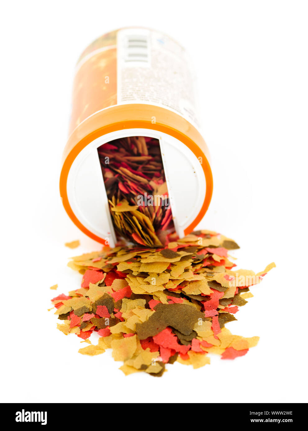 Aquarium fish food flakes in container isolated on white background ...