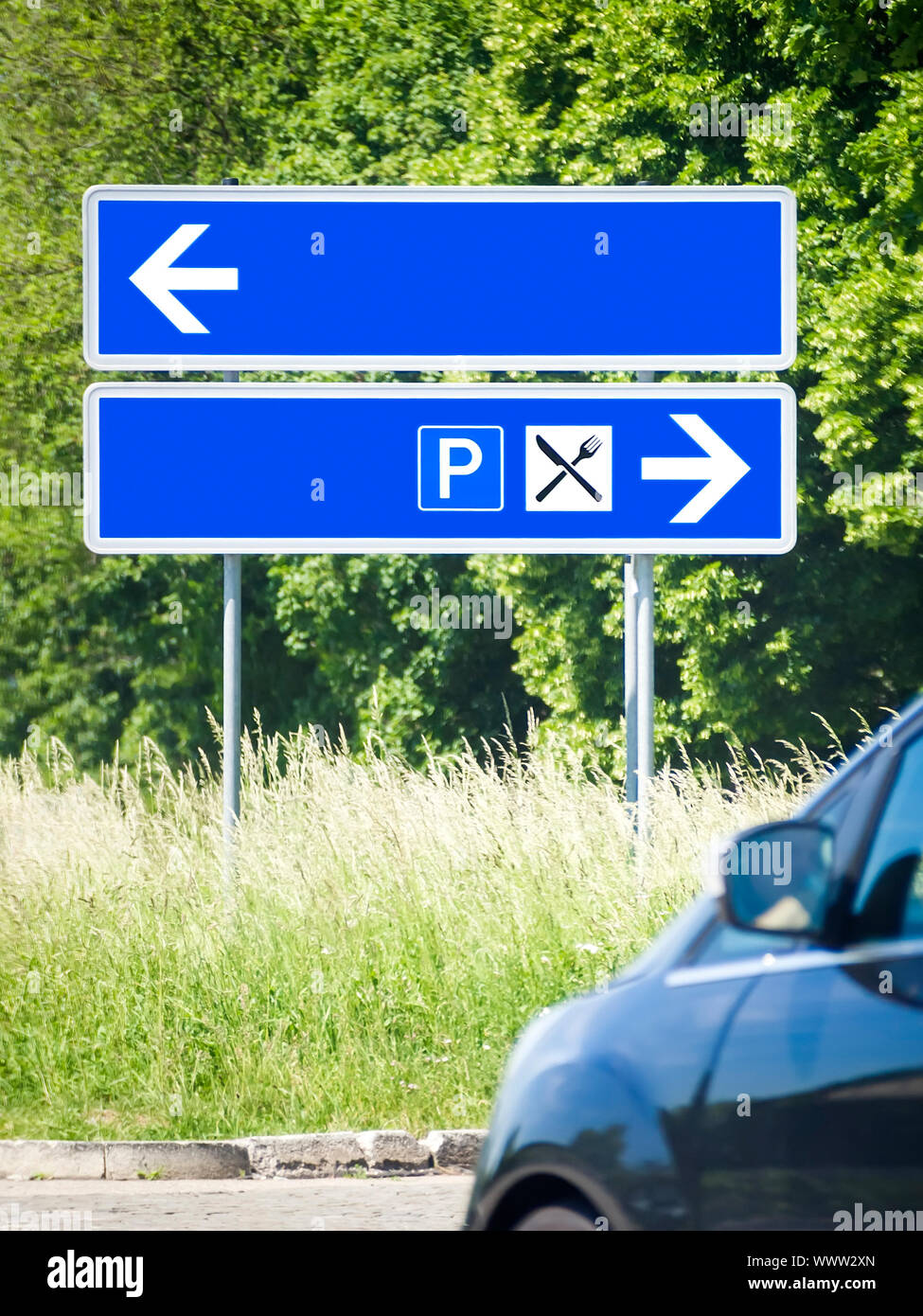 An image of a german blue road sign Stock Photo - Alamy