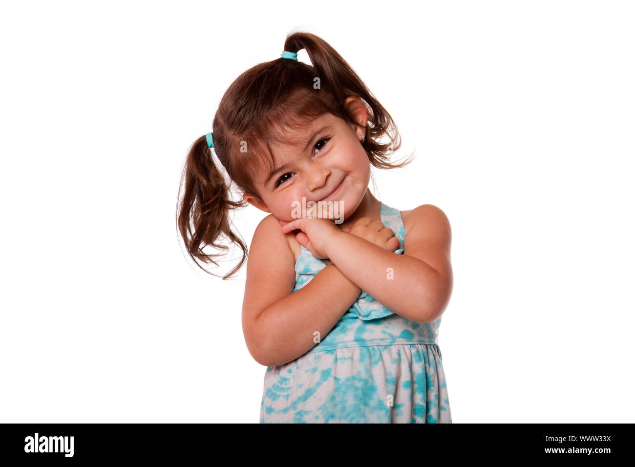 Happy smiling toddler girl with beautiful cute expression and pigtails ...