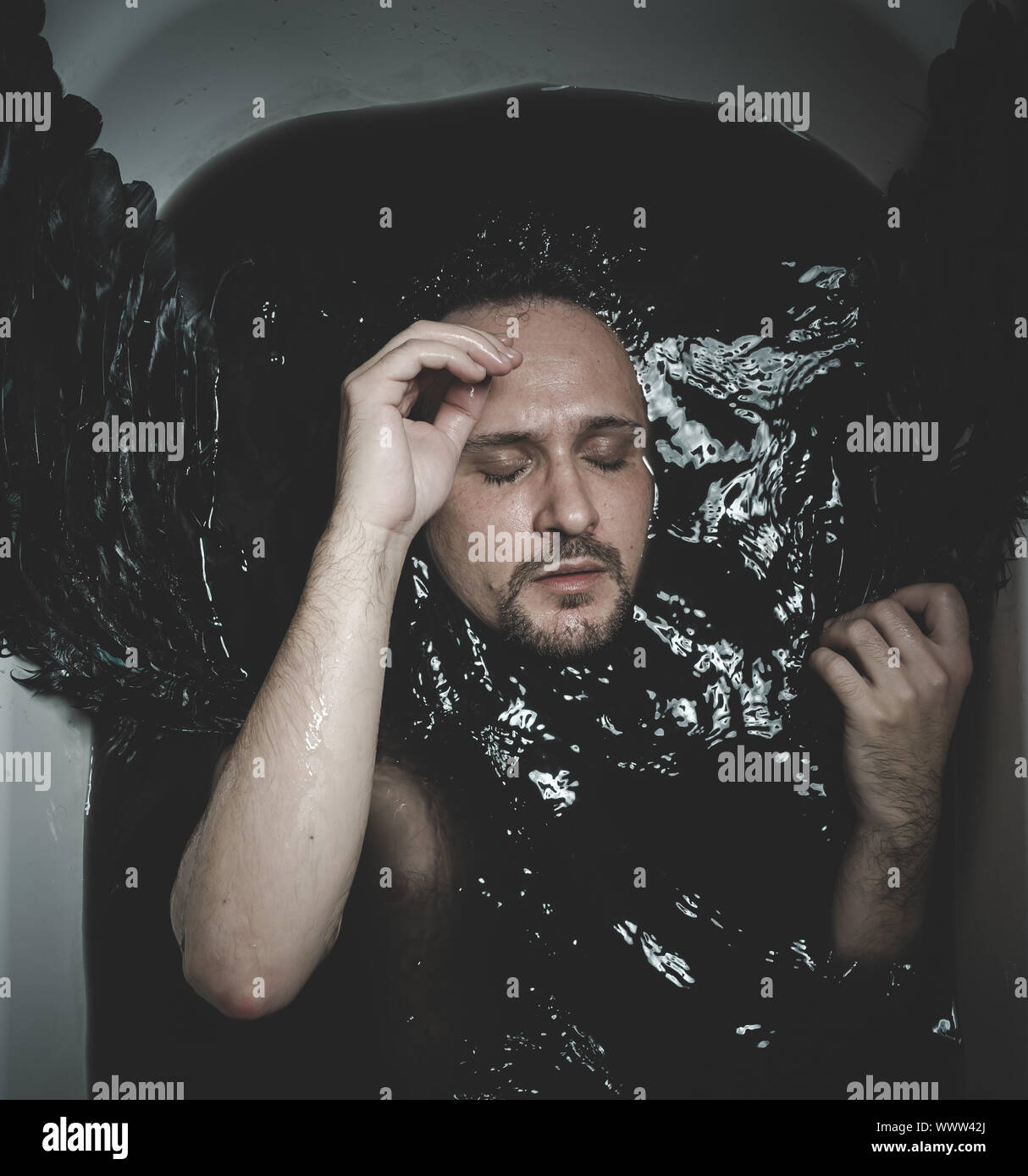 Gothic, Fallen angel, man in a bathtub with black water and wings ...