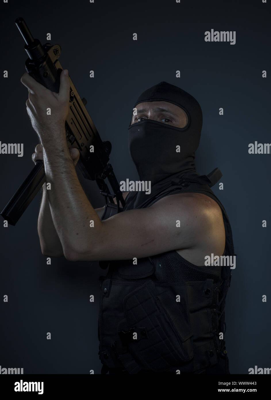 Military, Terrorist, a man dressed in a bulletproof vest and balaclava ...