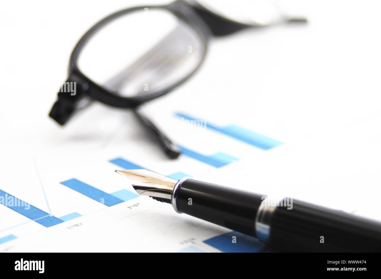 paperwork with diagram and pen showing success Stock Photo - Alamy